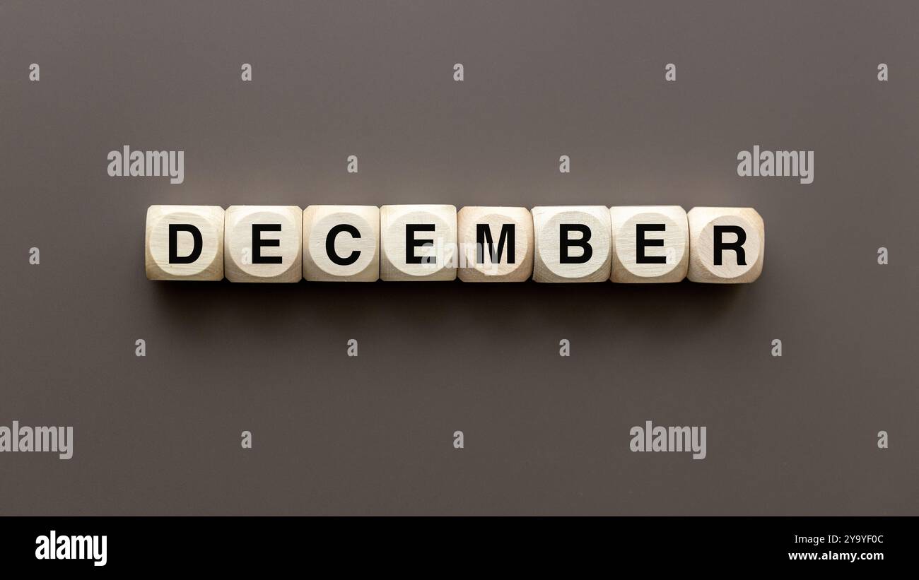 December symbol. Conceptual word December on wooden blocks on beautiful ...
