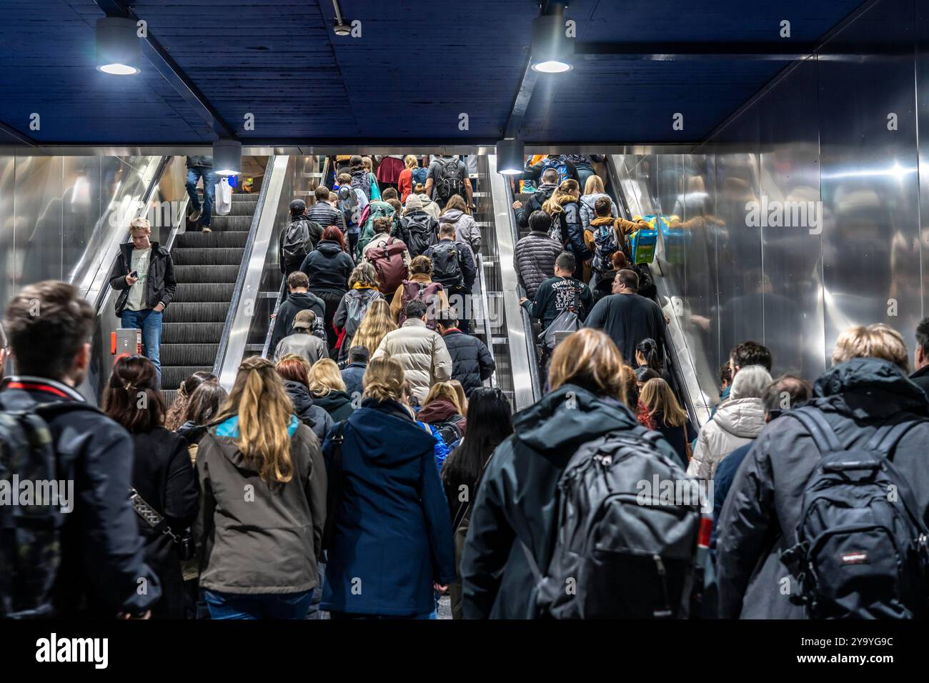 Public transportation, subway, central station exit, many people ...