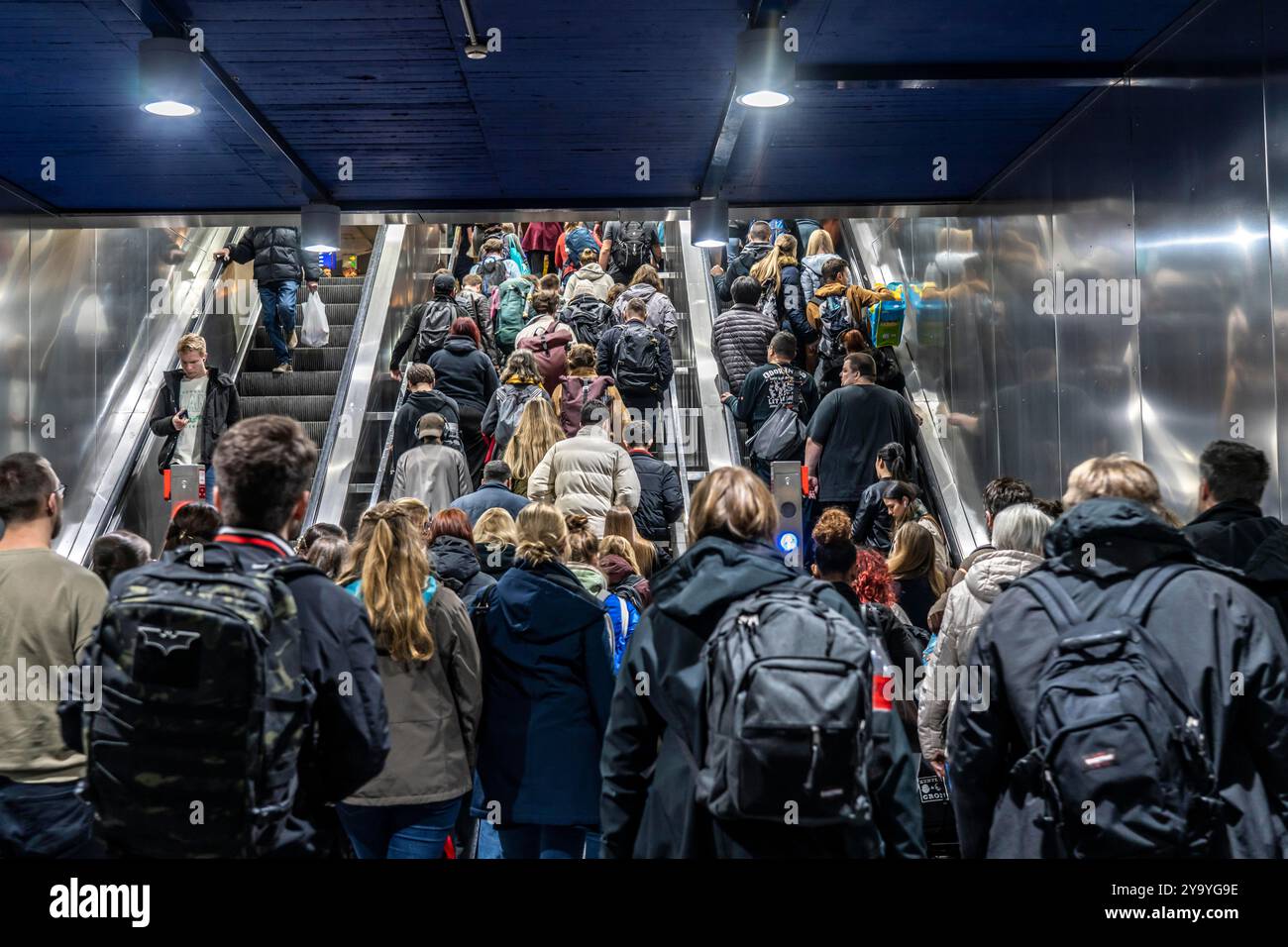 Public transportation, subway, central station exit, many people ...
