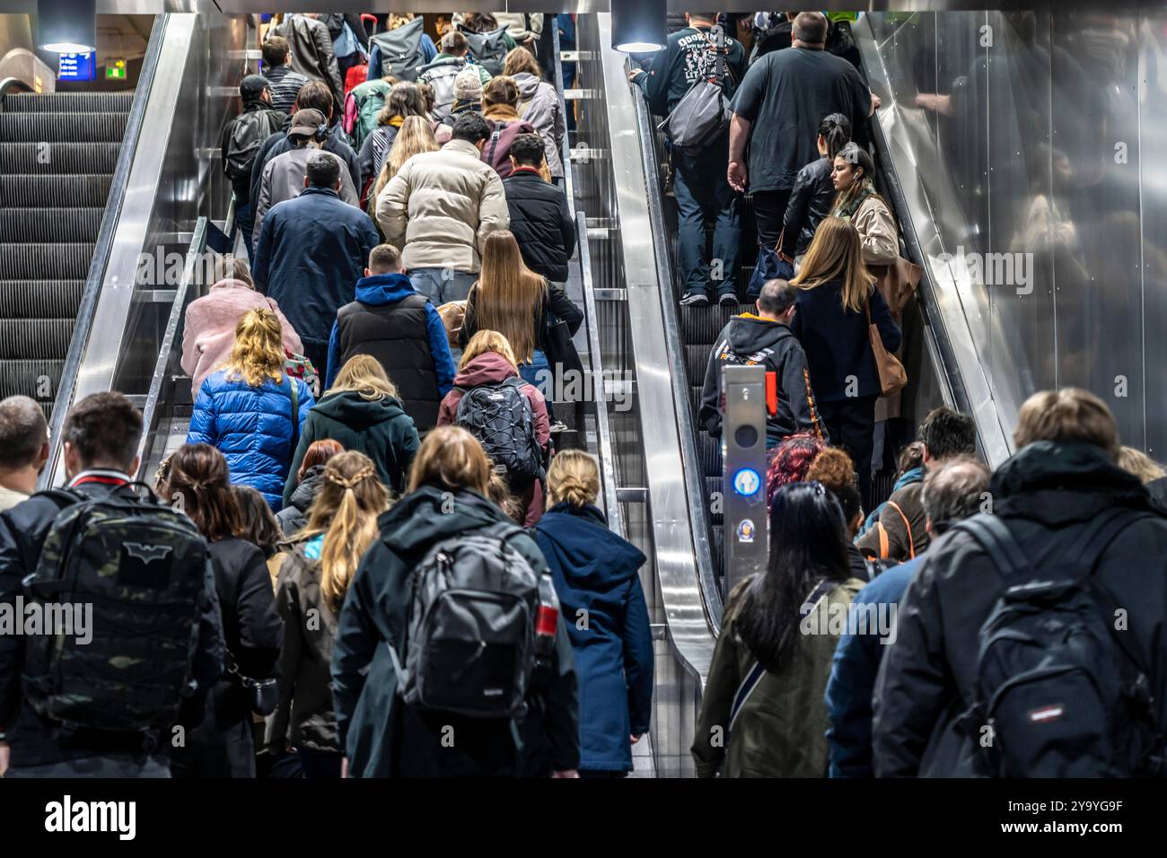 Public transportation, subway, central station exit, many people ...