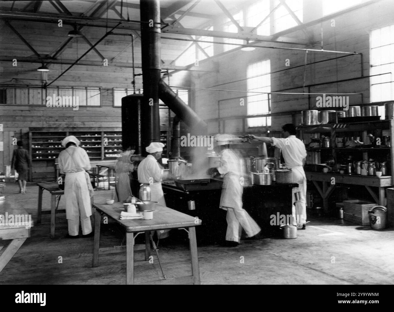 Japanese Canadians working in kitchen in Hastings Park during Japanese ...