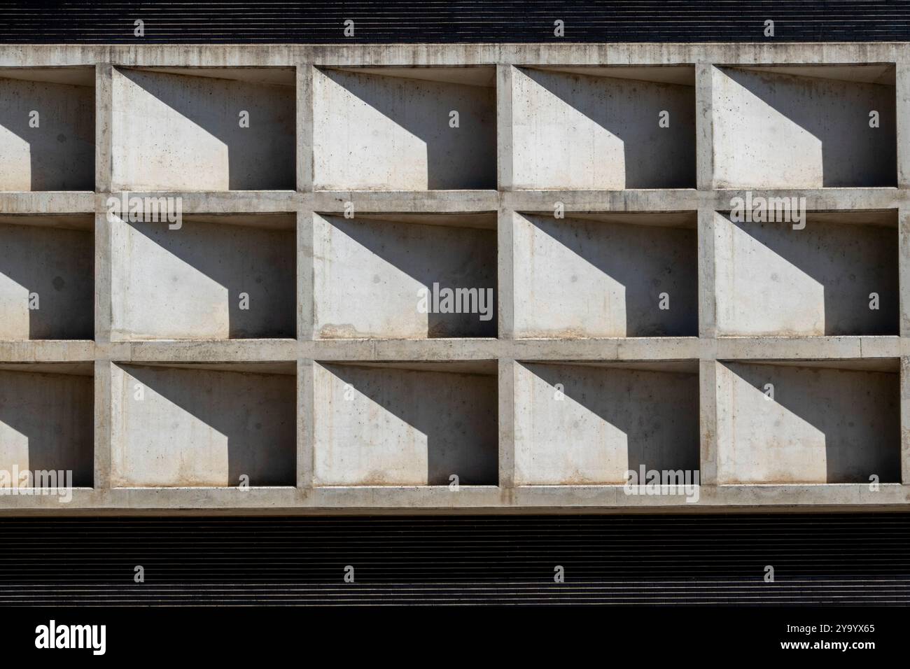 Architectural detail of the facade of a building with concrete blocks ...