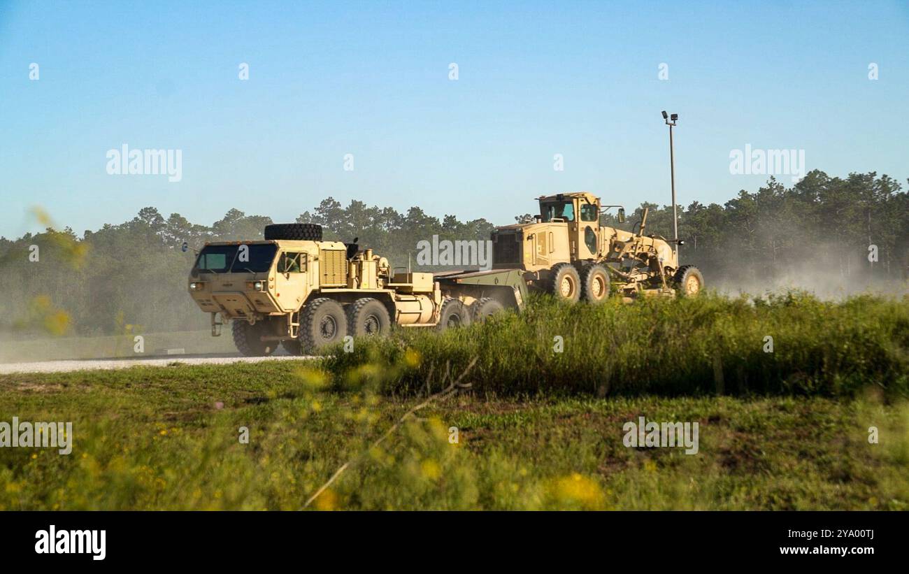 A Louisiana National Guard convoy arrives at the 7th Special Forces ...