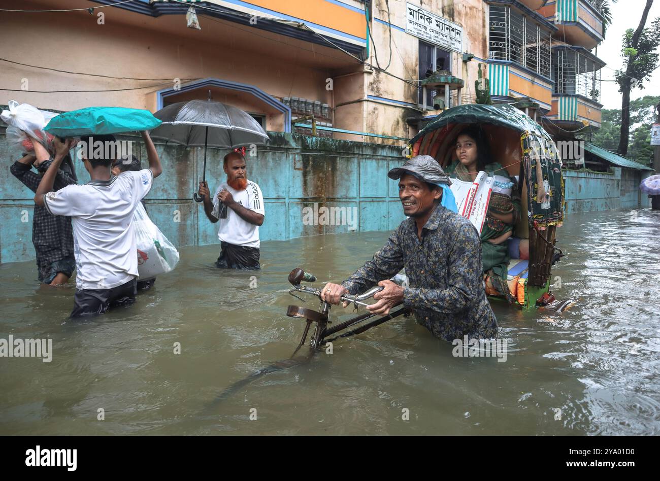August 22, 2024, Feni, Chittagong, Bangladesh: A rickshaw carrying a ...