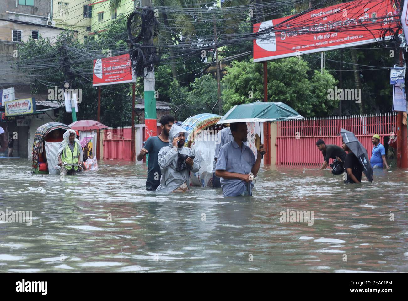 August 22, 2024, Feni, Chittagong, Bangladesh: People walk in waist ...