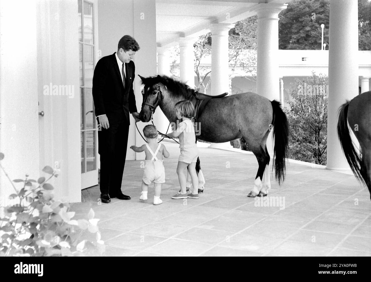 U.S. President John Kennedy and his children, John Kennedy, Jr., and ...