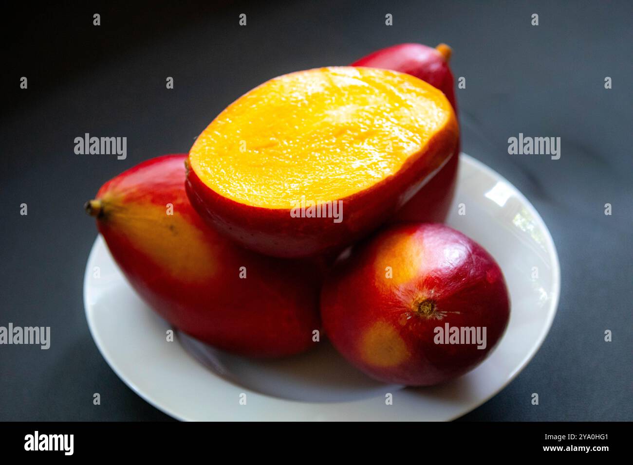 Brazilian mangoes of the Palmer species, ripe and isolated Stock Photo ...