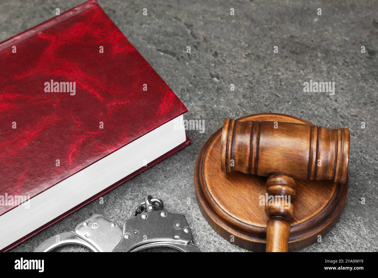 Handcuffs book judges gavel hi-res stock photography and images - Alamy