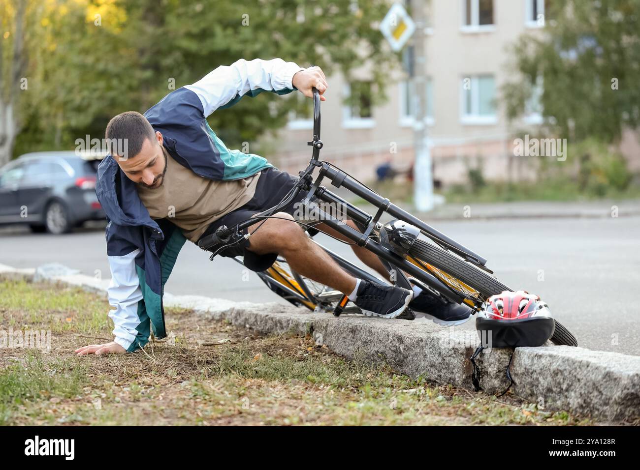 Man falling off bike hi-res stock photography and images - Alamy