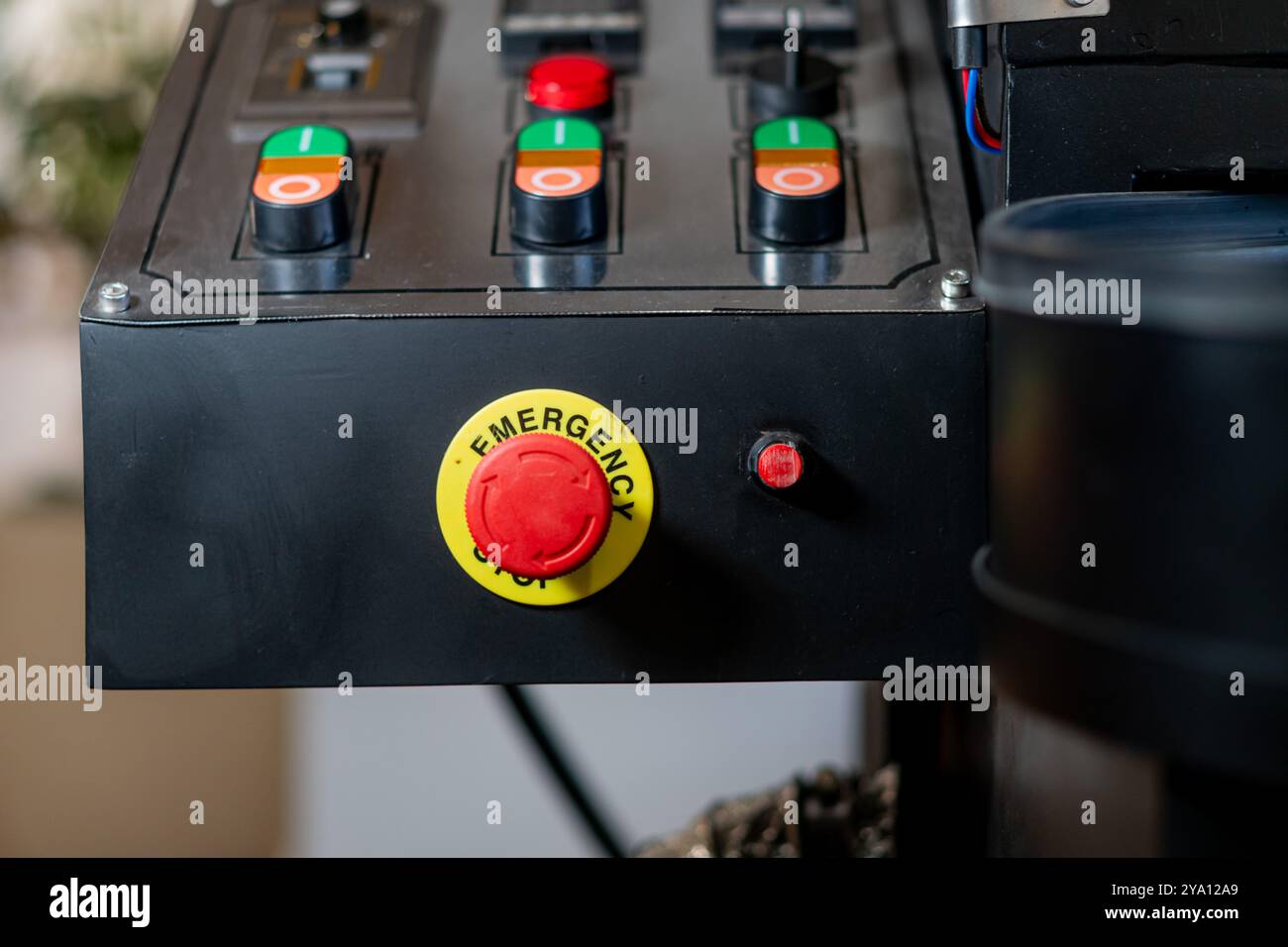 Close-up of a control panel featuring various buttons, including an ...