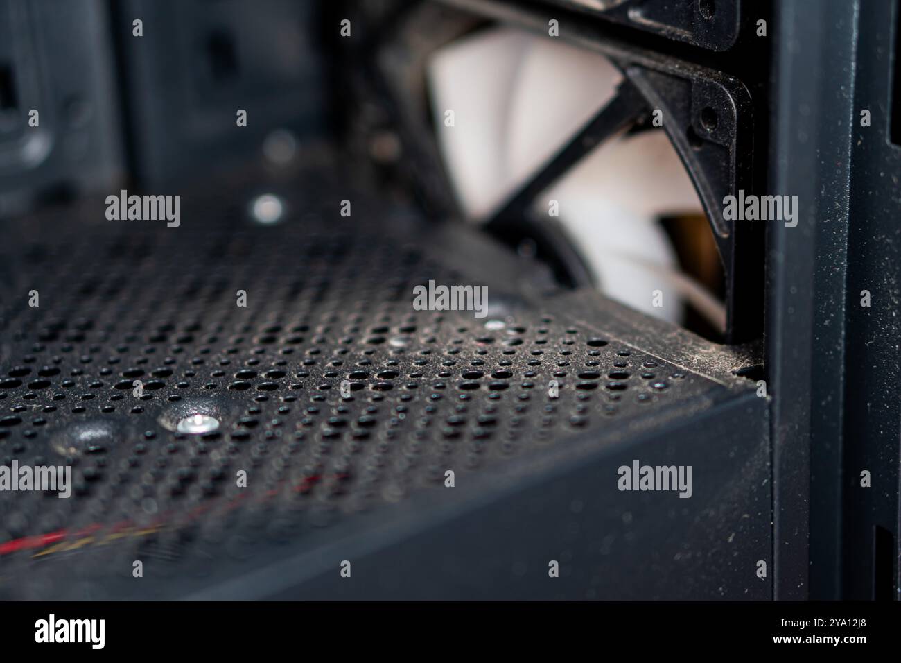 Close-up view of a computer case interior showing a cooling fan and ...