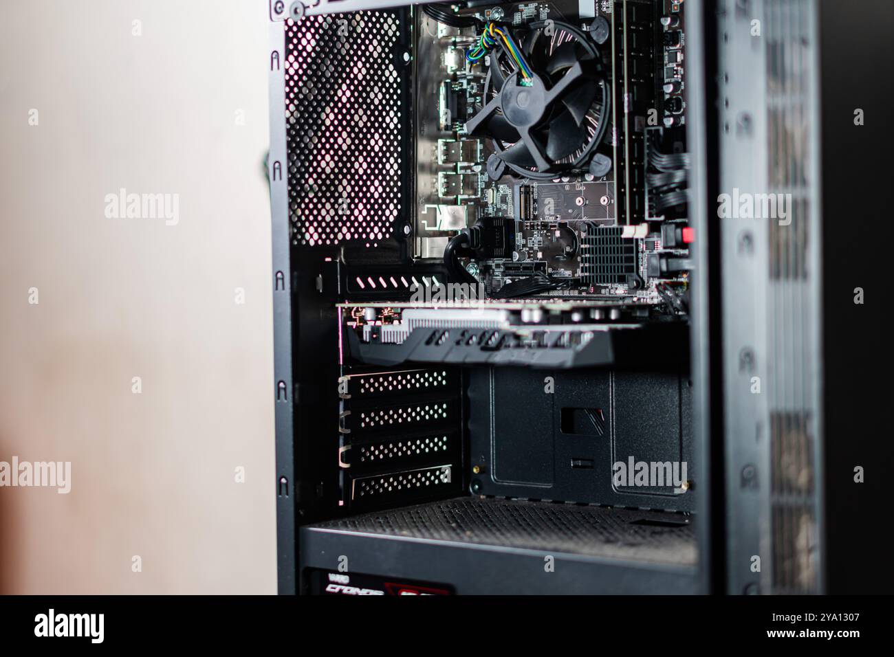 A close-up view of a computer case showcasing the internal components ...
