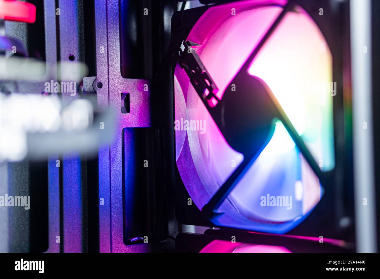 Close-up view of a computer case fan with RGB lighting, showcasing ...