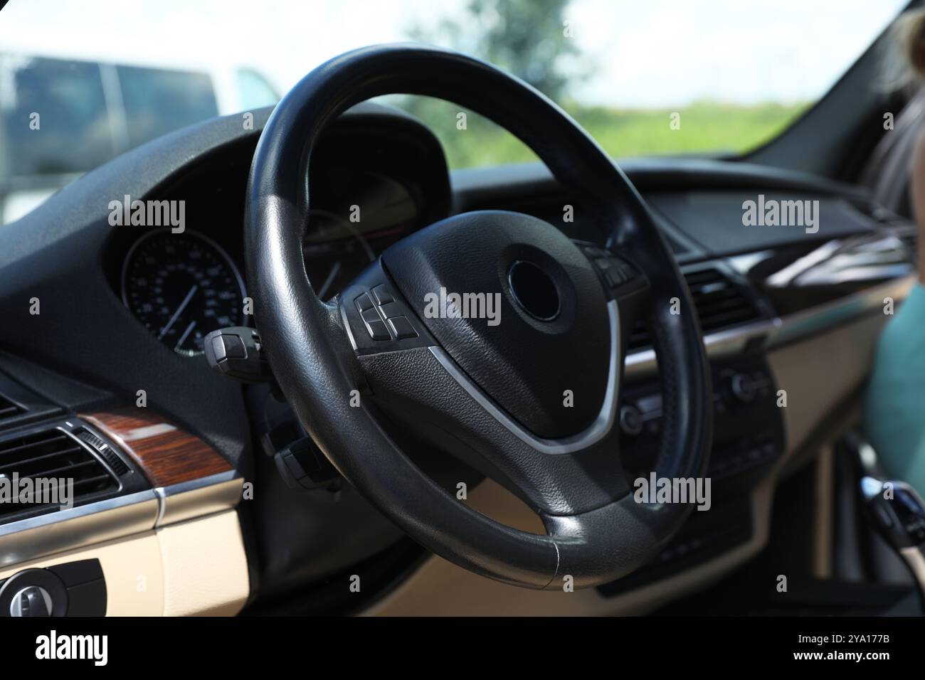 Steering wheel in modern car, view from inside Stock Photo - Alamy