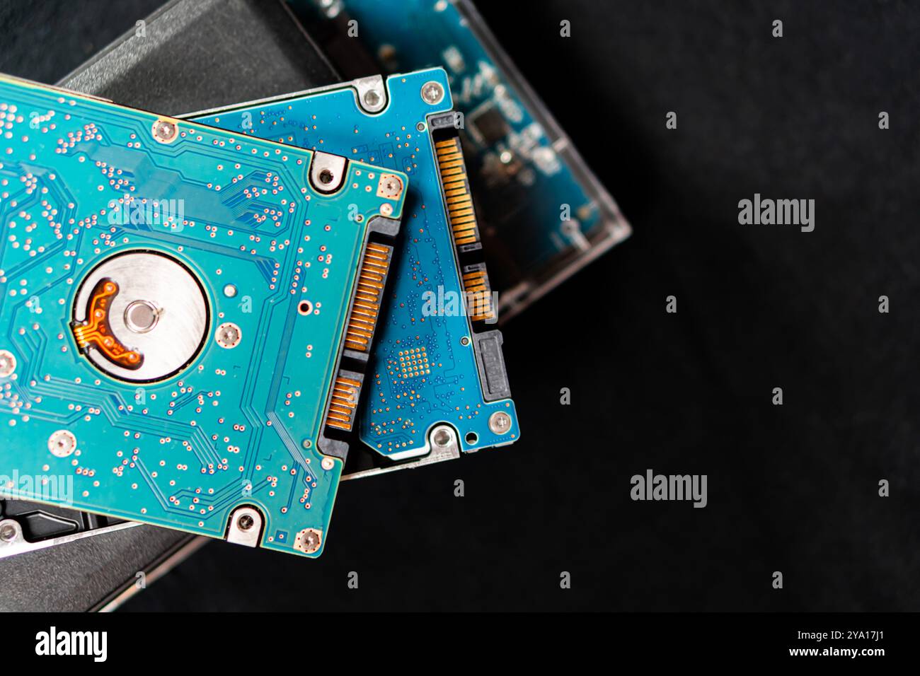 Close-up of multiple hard drives stacked together, showcasing their ...