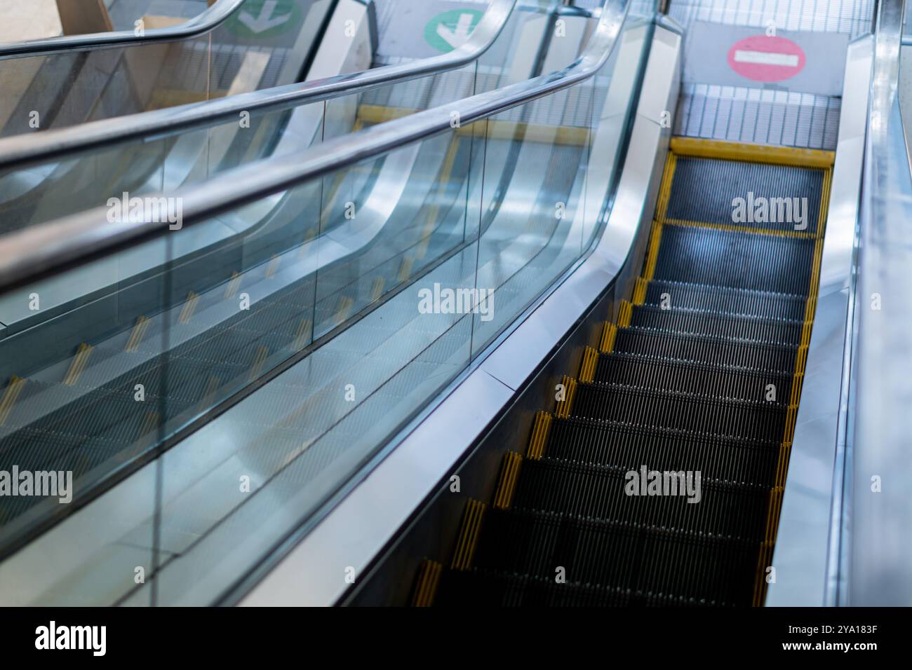 A close-up view of an escalator, showcasing the metallic steps and ...