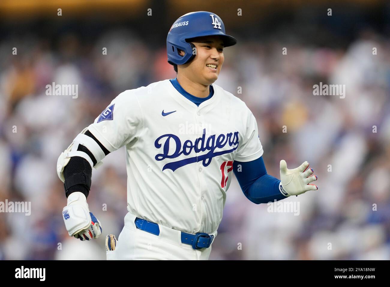 Los Angeles Dodgers' Shohei Ohtani runs back to the dugout after ...