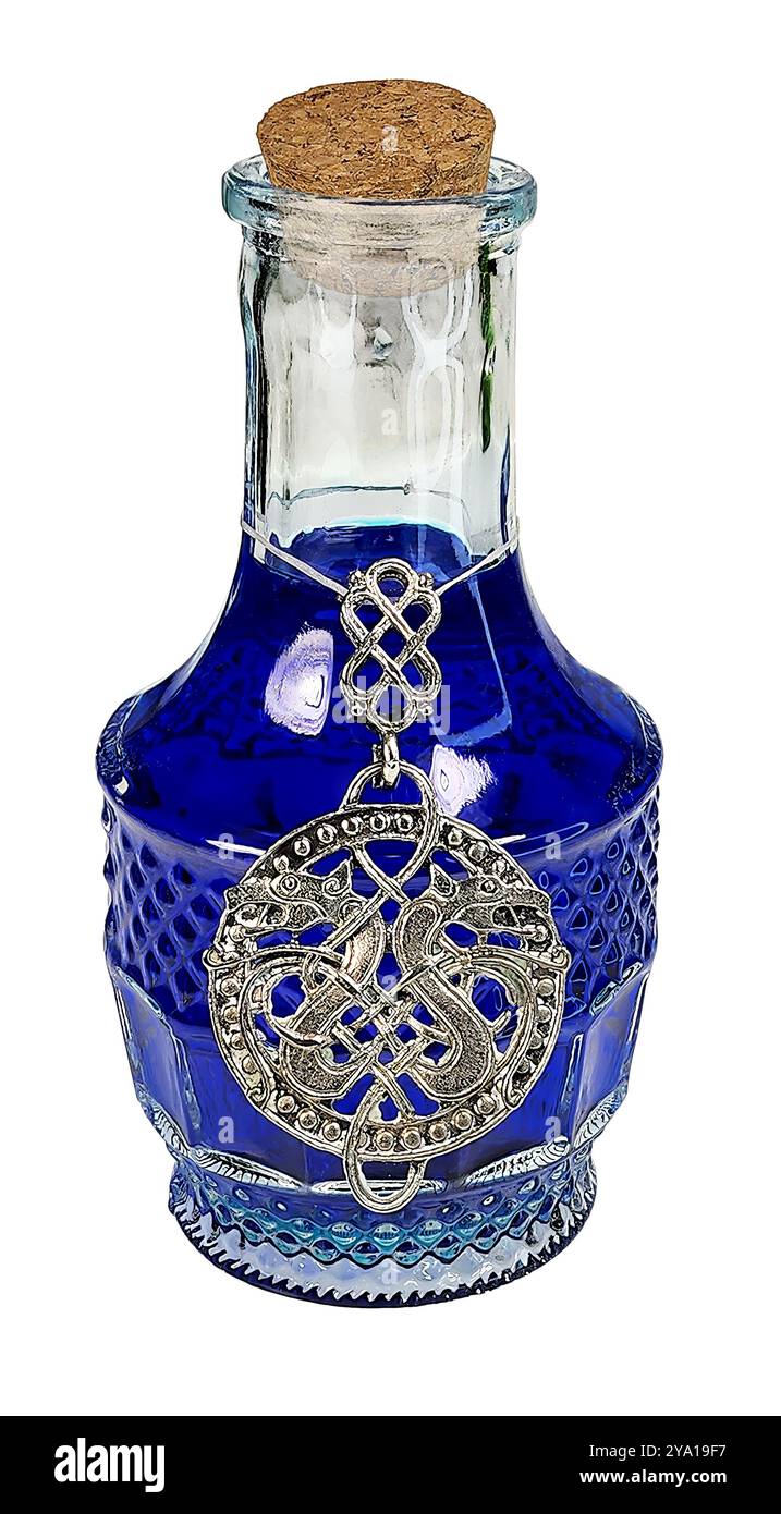 A colorful magic potion in a bottle with dragon symbols Stock Photo - Alamy