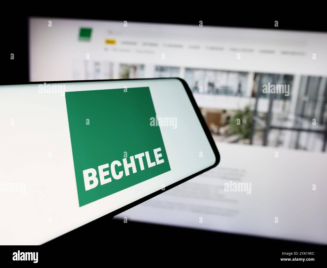 In this photo illustration, a mobile phone with the logo of German information technology ...