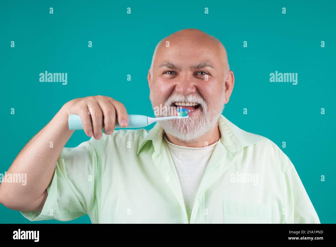 Brushing teeth. Senior holding toothbrush for tooth brushing. Dentistry ...