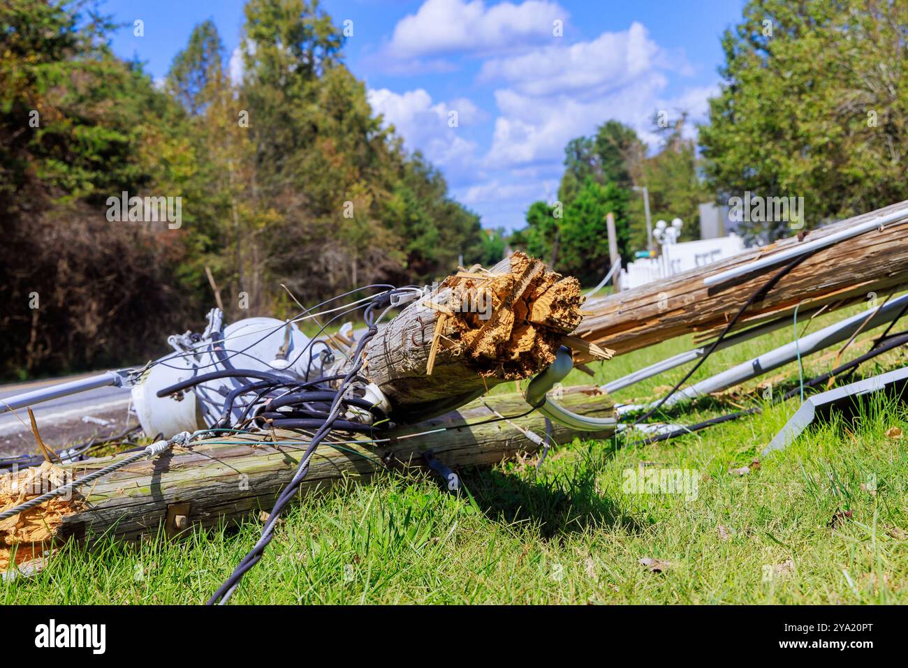 In course of strong tornado, wind has broken electric poles with wires ...