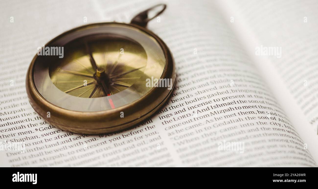 Compass on christian holy bible hi-res stock photography and images - Alamy