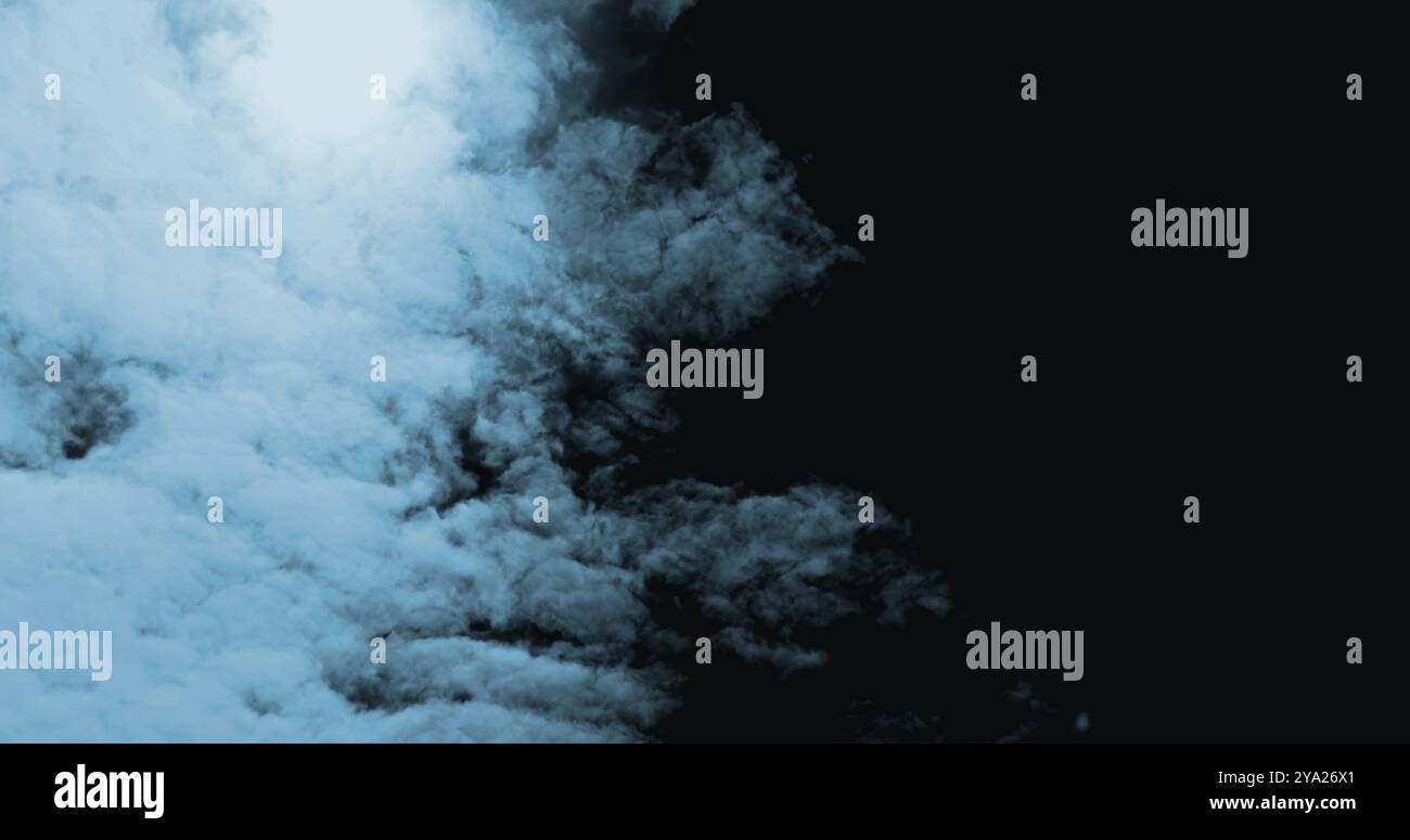 Image of fluffy stormy grey and black clouds flying fast through blue ...