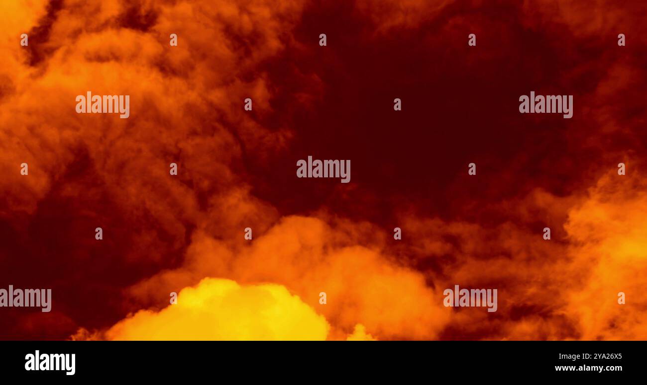 Image of fluffy stormy orange and yellow clouds flying fast through the ...