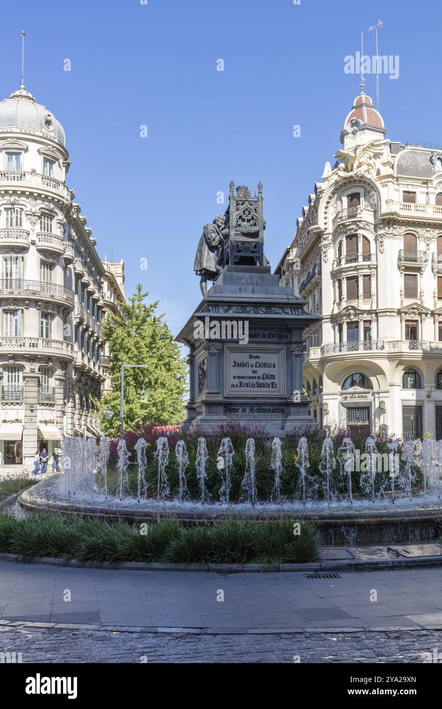 Magnificent monument and bubbling fountain amidst historic buildings in ...