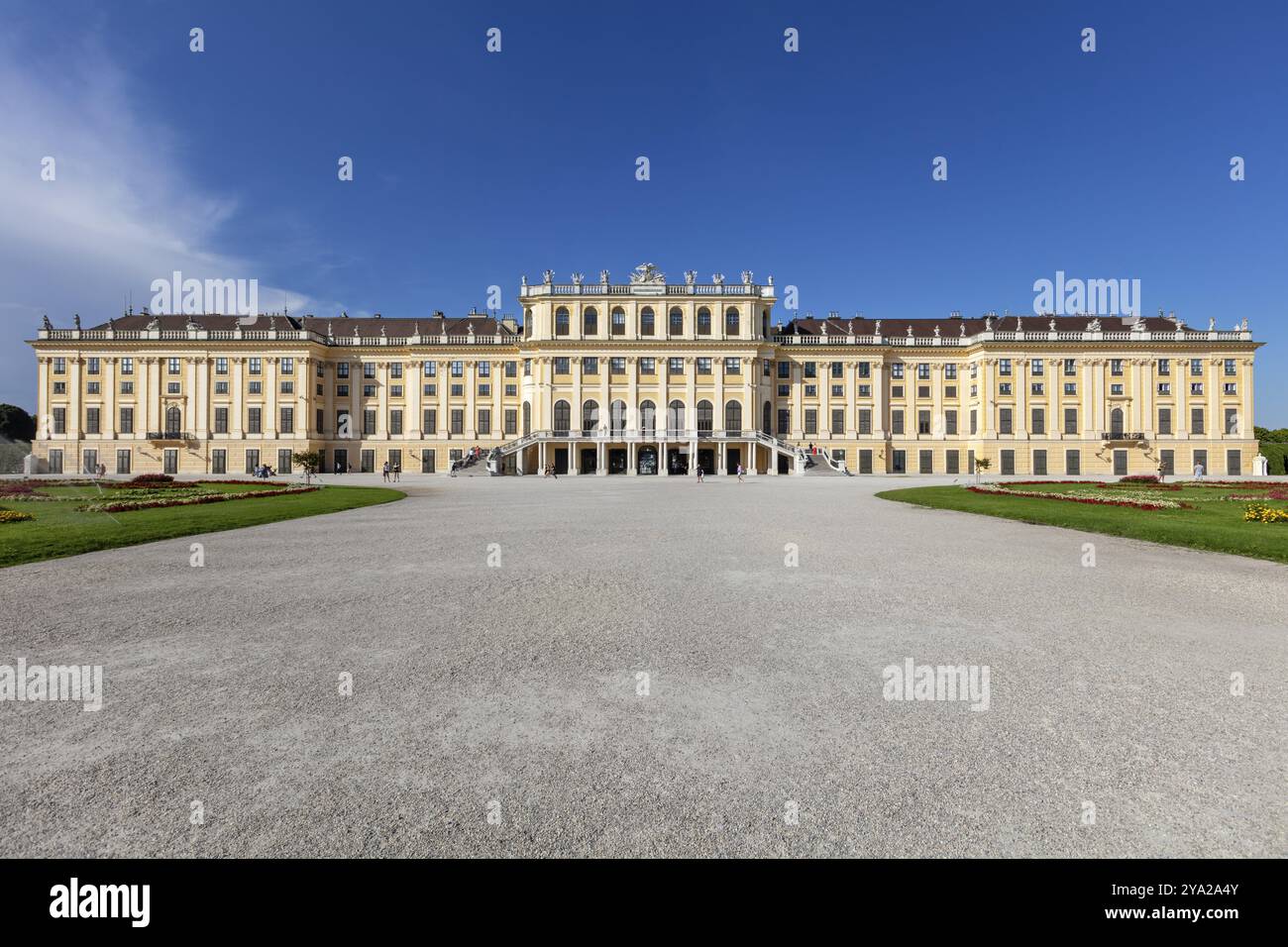 Magnificent baroque palace with symmetrical architecture against a blue ...