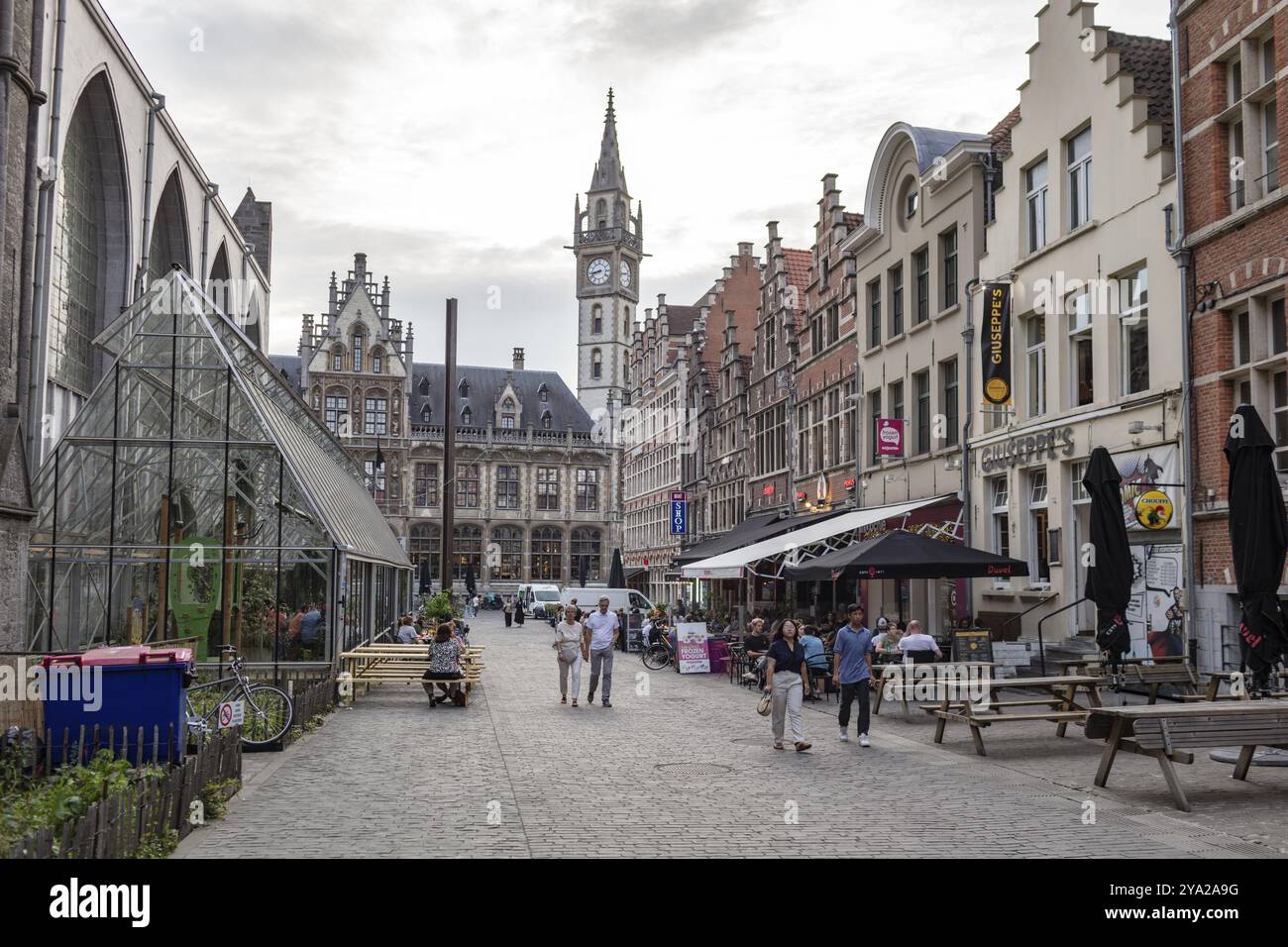 Town square with people and historic buildings, including a striking ...