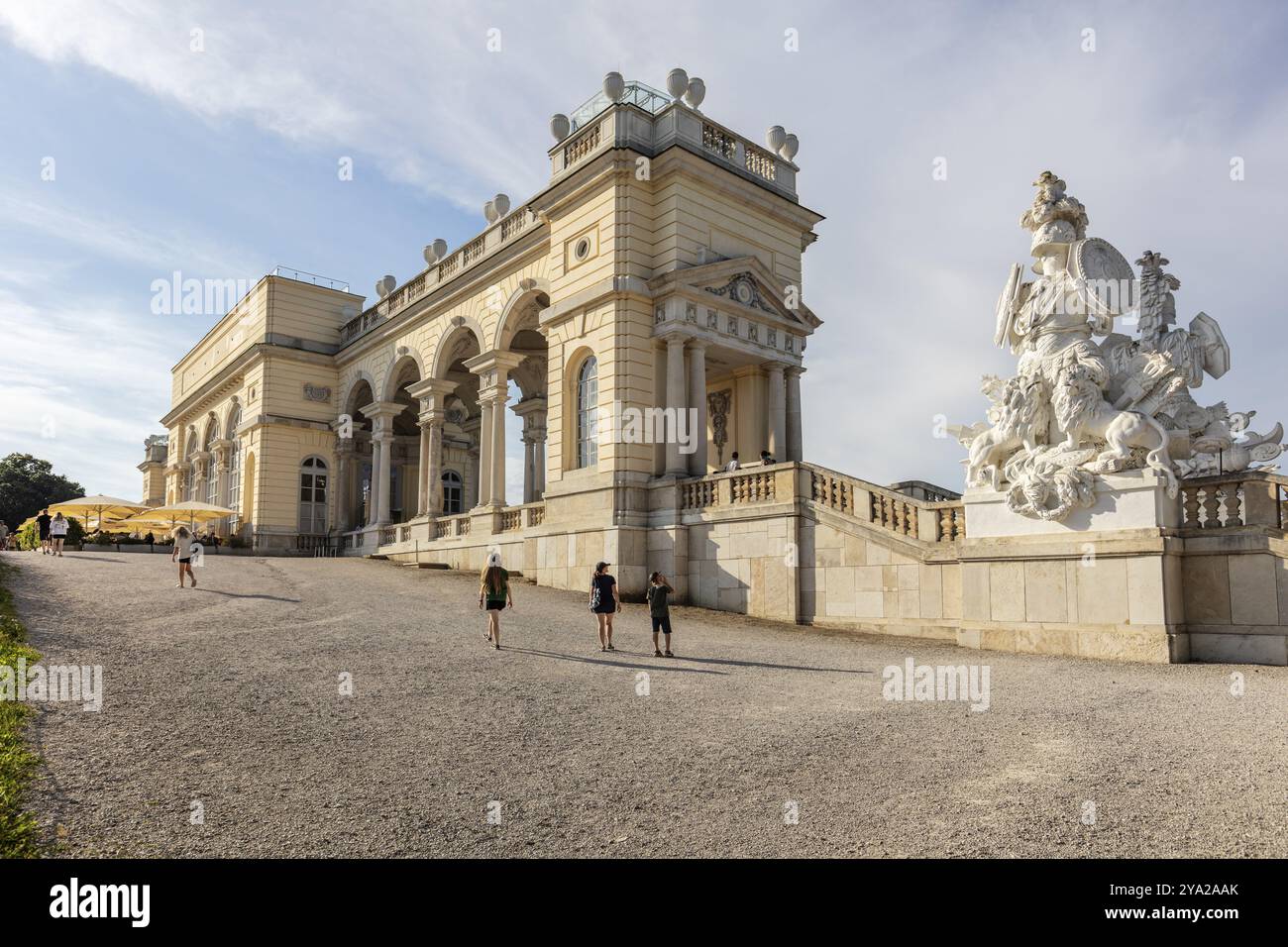 Monumental building with sculptures and columns, in an open area under ...