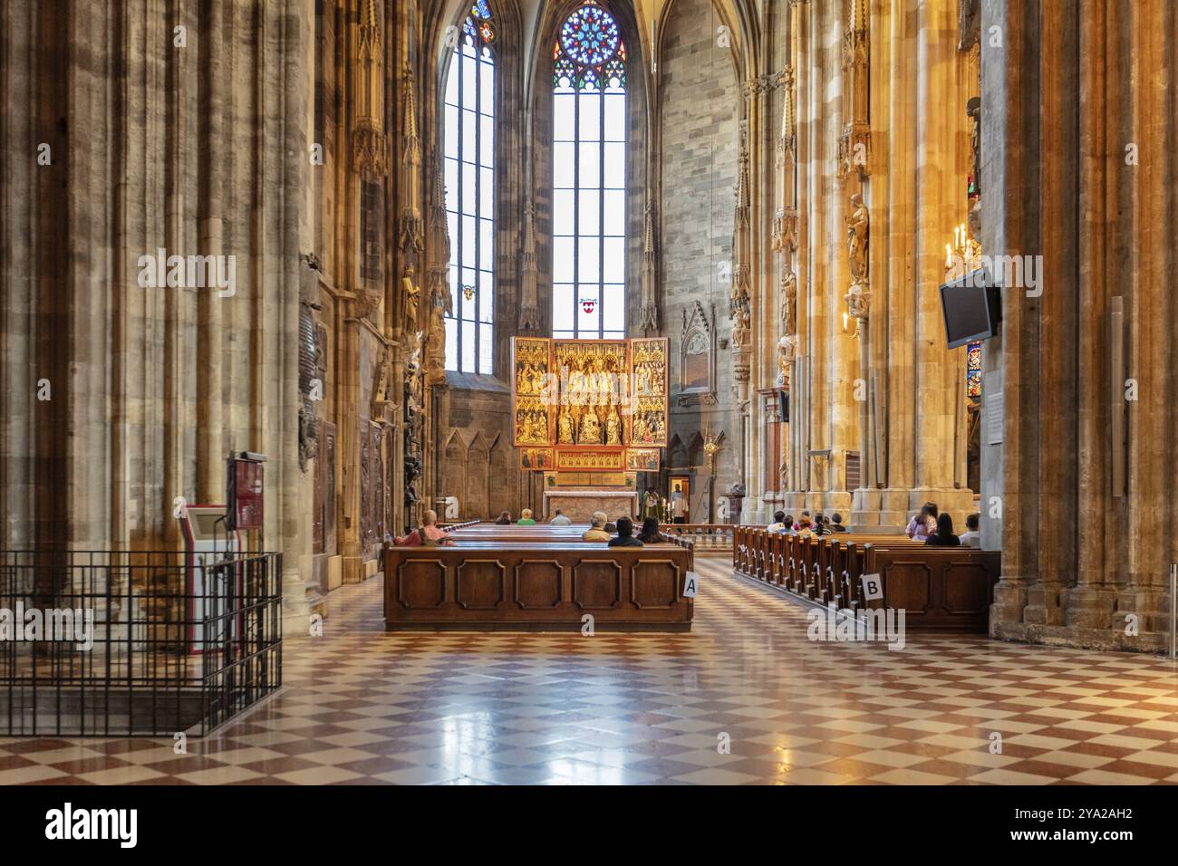 Bright Gothic church interior with impressive windows and decorated ...