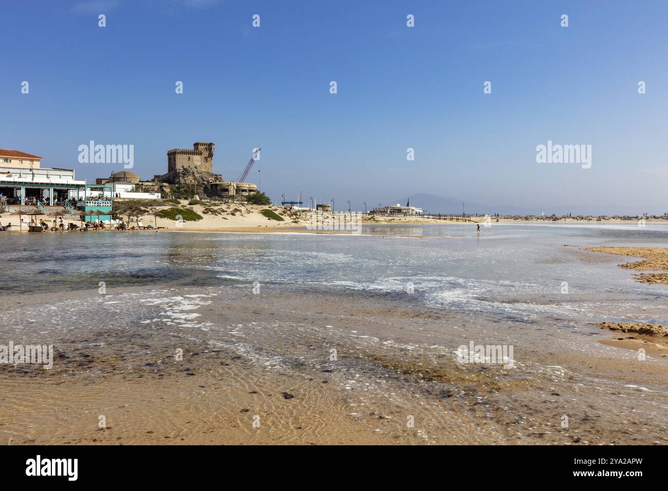 Coastal view with historic architecture in the background and wide ...