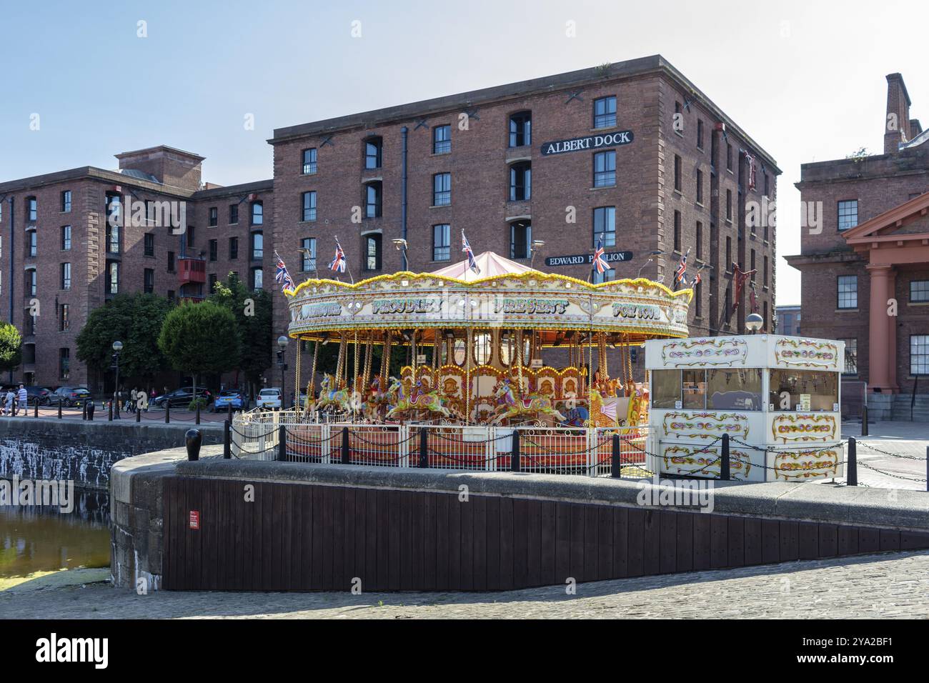 Roundabout in front of old brick buildings at Albert Dock, Liverpool ...