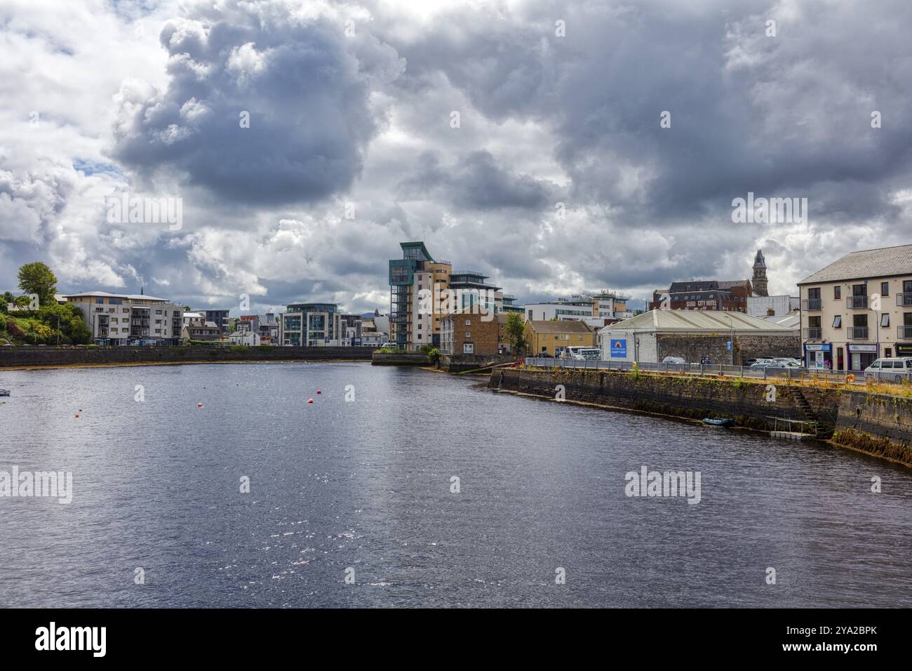 River in a modern city with dramatic sky and clouds, Sligo Stock Photo ...