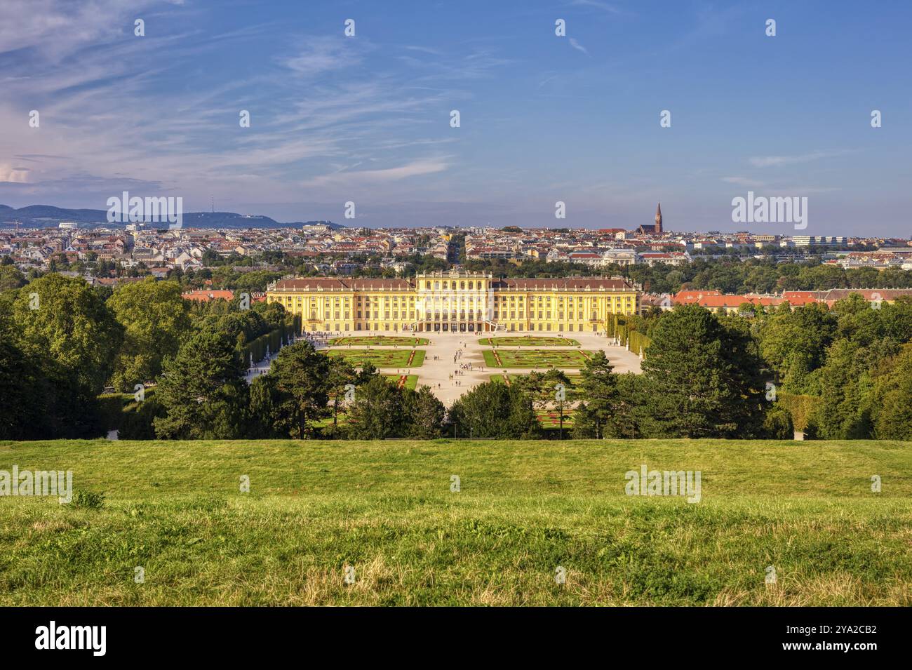 Magnificent palace with large gardens and a view of the city beyond ...