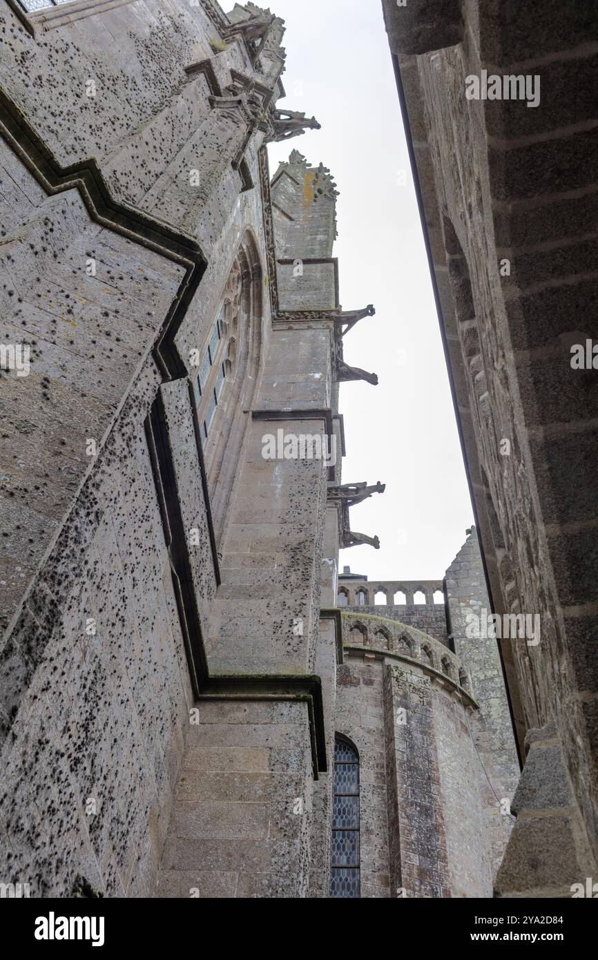 Gothic church walls and stone towers in impressive perspective, Le Mont ...