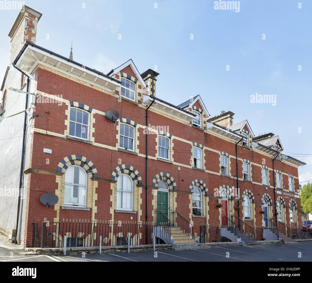 Historic brick terraced house with white decorations and regularly ...