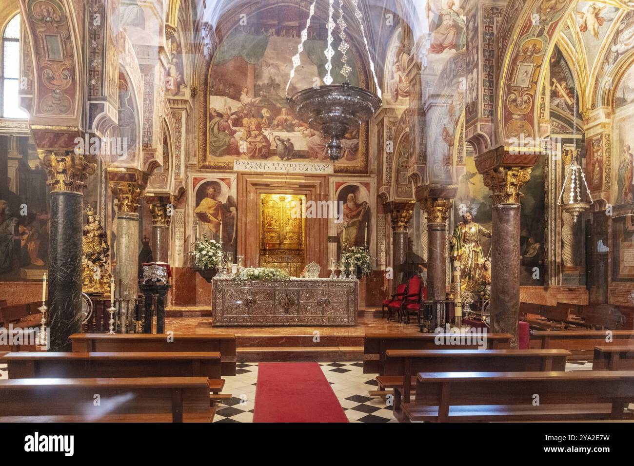 Small chapel with Renaissance altars, frescoes and rich sacred ...