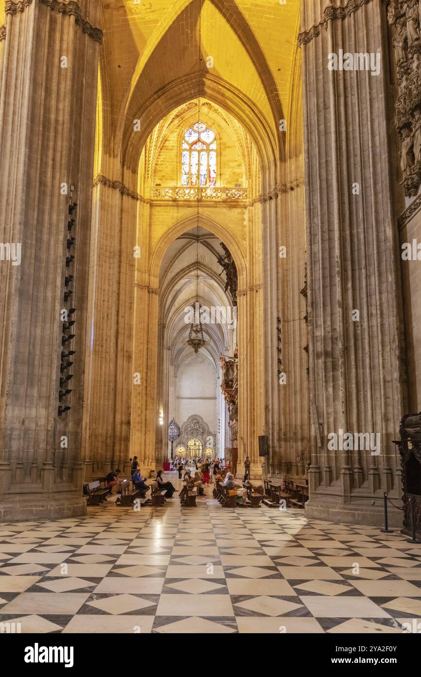Towering Gothic church with impressive columns and large windows ...