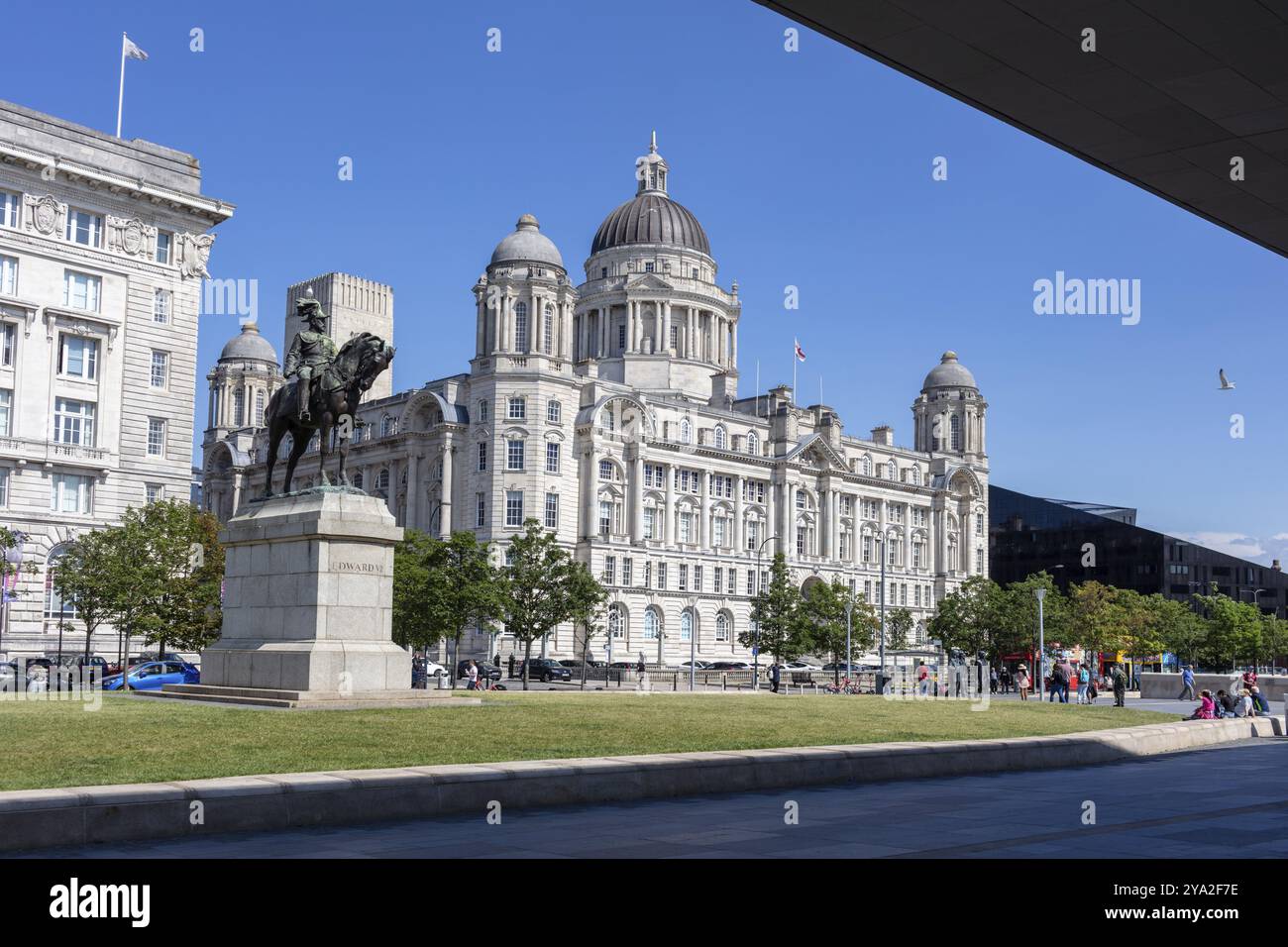Equestrian statue in front of a magnificent historic building in sunny ...