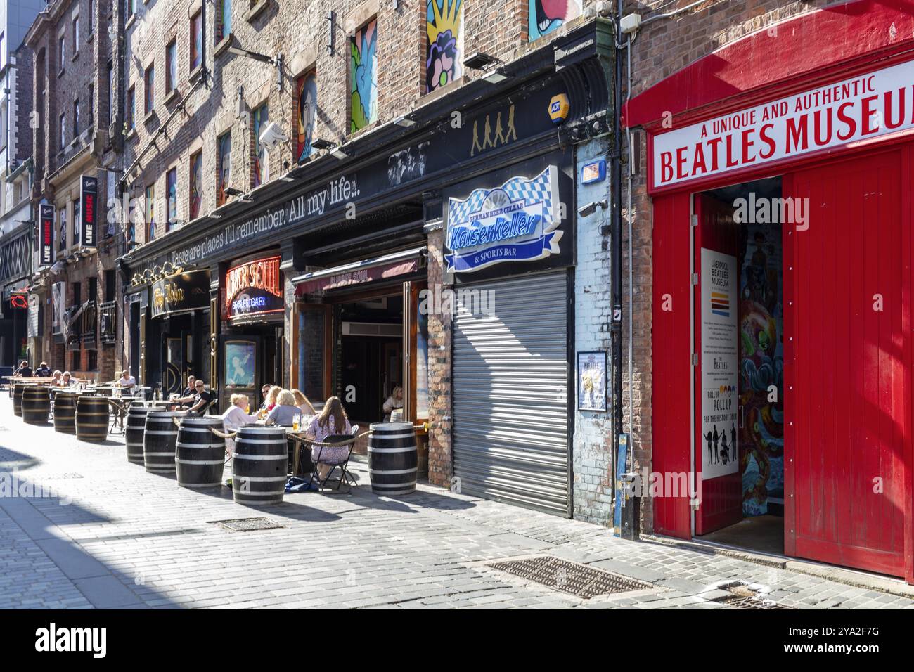 Urban scene with the Beatles Museum and outdoor cafes, Liverpool Stock ...