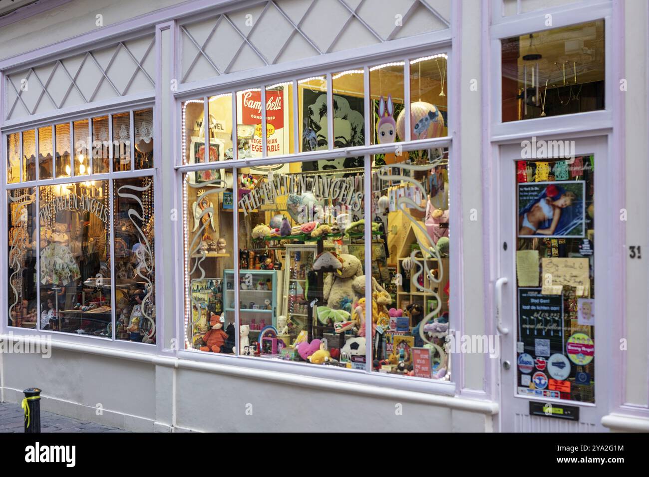 Colourful shop window of a shop full of toys and figures, Ghent Stock ...