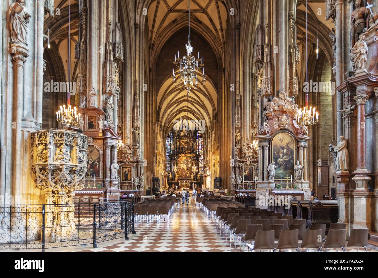Magnificently decorated church interior with ornate vaults and rich ...