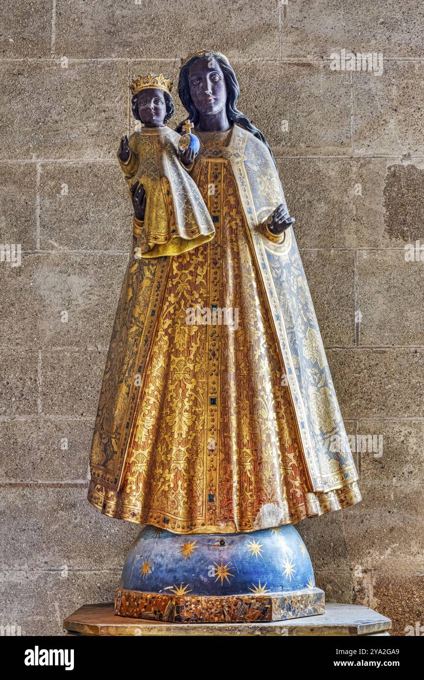 Holy Madonna and Child in a splendid gold and blue robe on a plinth, Le ...