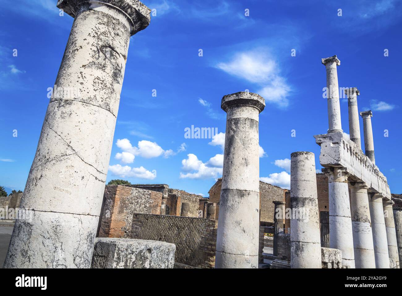 Pompeii in Italy, ruins of the antique Temple of Apollo with bronze ...