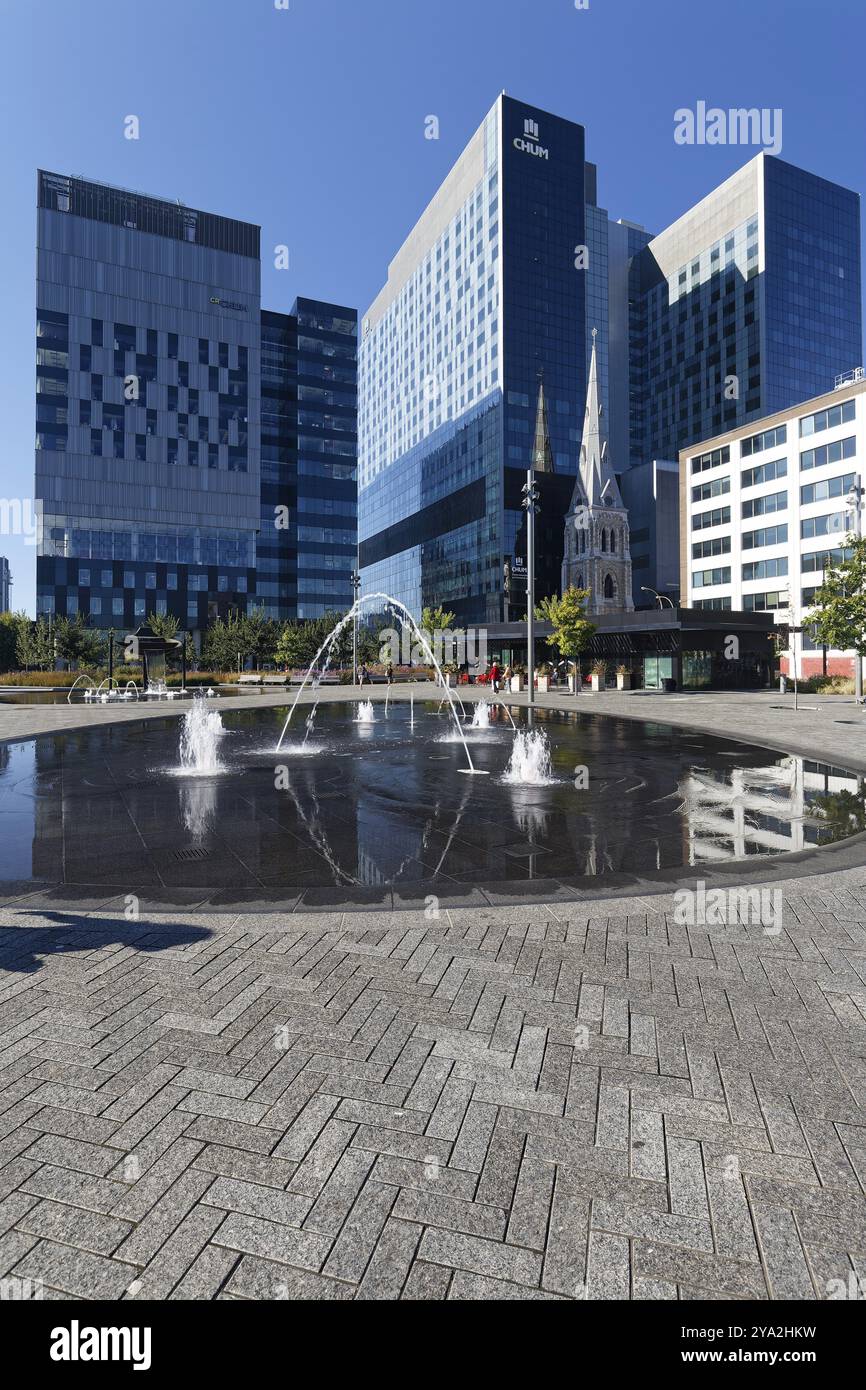 Architecture, square with fountain and modern clinic buildings ...