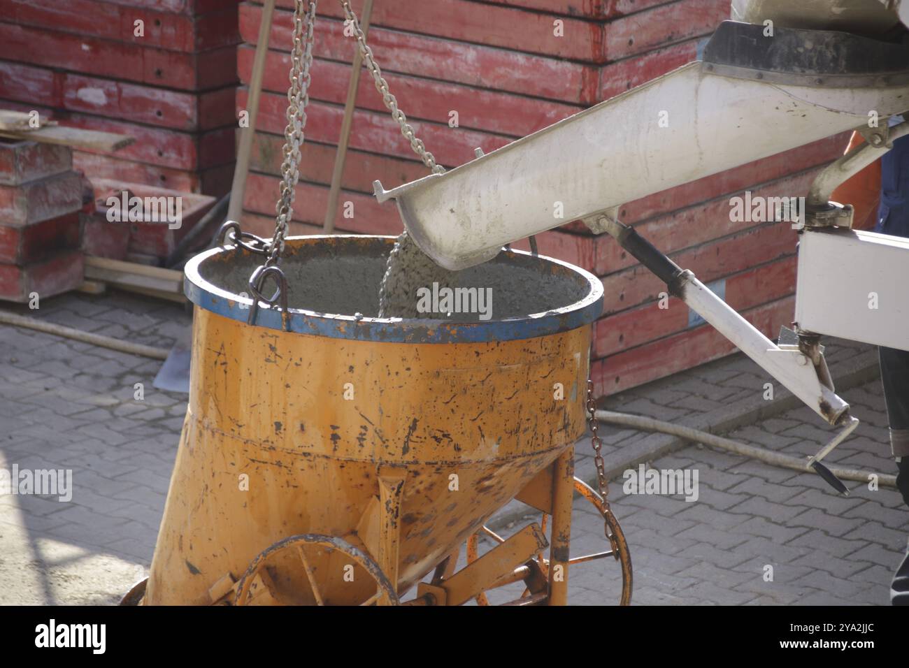 Filling a concrete silo with liquid concrete Stock Photo - Alamy