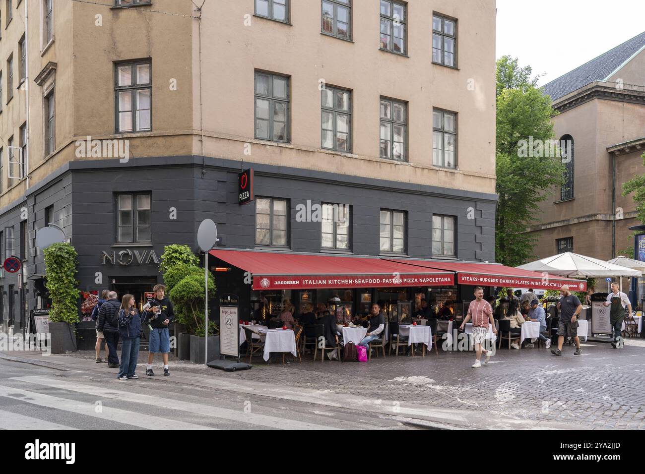 Copenhagen, Denmark, May 31, 2023: People in an outdoor restaurant on ...